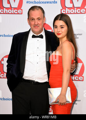 Ross Boatman and guest attending the TV Choice Awards held at the ...