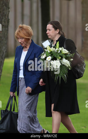 Unidentified mourners after the funeral mass of Nora Quoirin at St ...