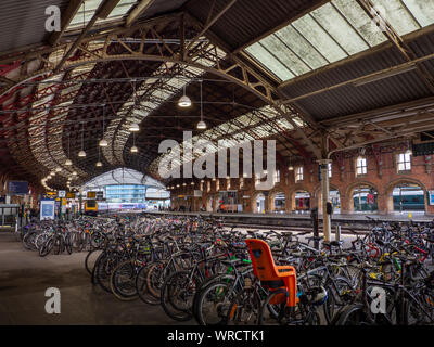 Child standing on train seat traveling inside high speed train. closeup ...