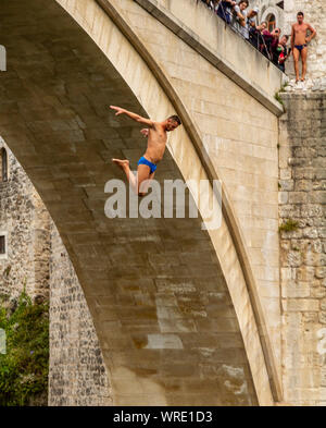 Bridge Diving in Mostar, Bosnia-Herzegovina Stock Photo - Alamy