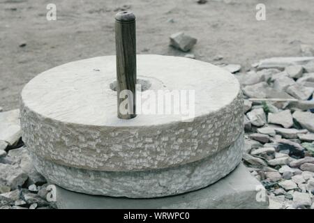 Old mill stone grinder Stock Photo - Alamy