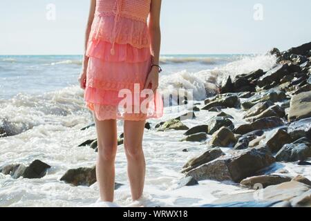 A woman wading through water in narrow canyon, Utah Stock Photo - Alamy