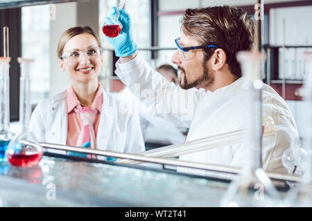 Analytical Chemists working in the lab looking at test result Stock ...