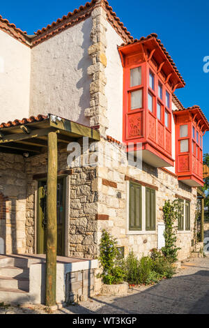 Alacati, Turkey - September 3rd 2019: Cobbled street and old stone ...