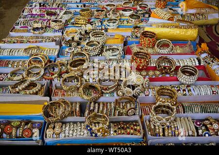 Bangles on a market stall Stock Photo - Alamy