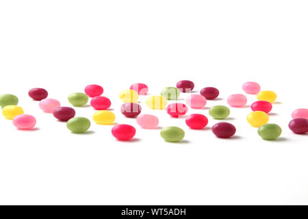 colorful candies jelly beans spread isolated on white background Stock ...