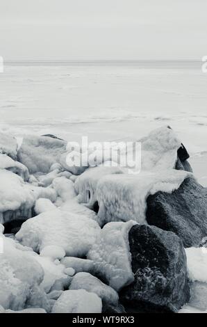 The frozen winter Azov sea on the beach of Taganrog city, Rostov region ...