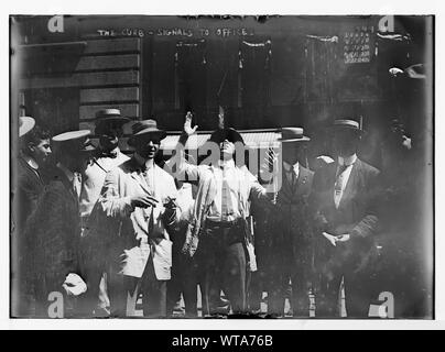 Men on curb, signals to offices Stock Photo - Alamy