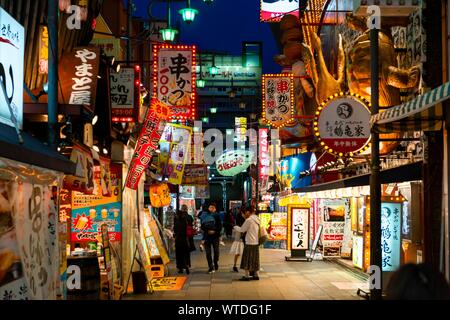 illuminated signs in Osaka Stock Photo - Alamy