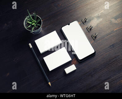 Business cards, pencil, eraser, plant Stock Photo - Alamy