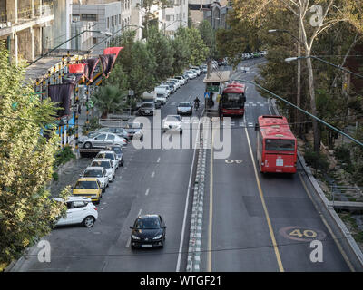 Tehran, Iran. 12th Sep, 2019. People walk on a sidewalk on Valiasr ...