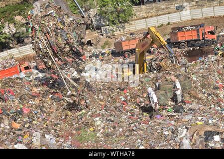 Bekasi, Indonesia. 11th Sep, 2019. Scavengers sort and collect plastics ...