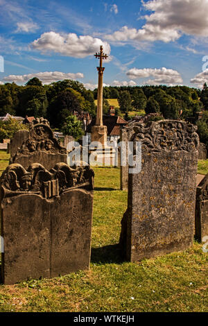 The church of St Mary. The Virgin at Westerham Kent. With storm clouds ...