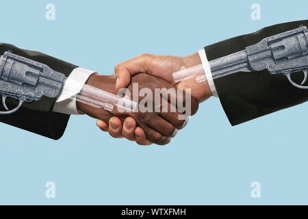 Be careful in your communication. Two male hands shaking in black suit ...