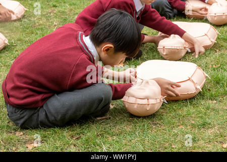CPR on training doll. resuscitation mannequin.Resuscitation Technique ...