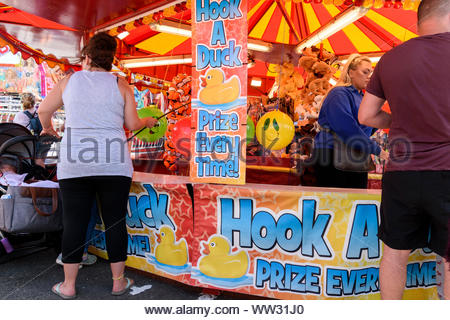 "Hook a Duck" fairground attraction where people can win prizes Stock ...