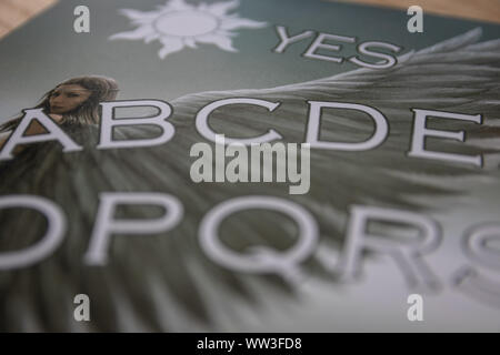 An angel board used to evoke spirits or angels much the same as a Ouija ...