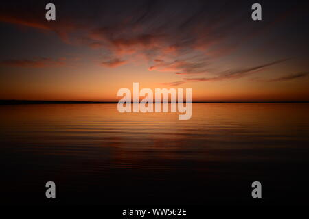 Twilight glow color palette of sunset lines in the dark blue night sky ...