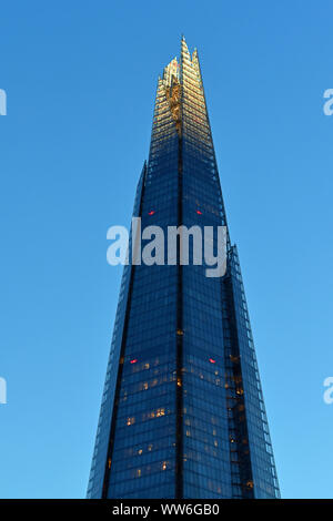 London UK - The Shard reflected in a glass office block building on the ...