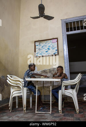 Children eating fish in selam restaurant, Northern Red Sea, Massawa ...