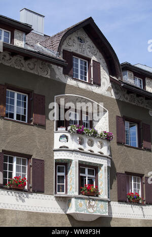 Facade of a typical Engadine house decorated with Sgraffito ornaments ...