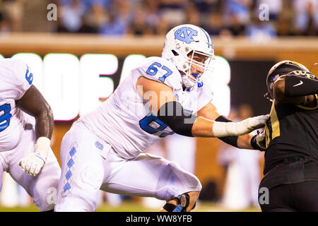 North Carolina offensive lineman Charlie Heck runs a drill at the NFL ...