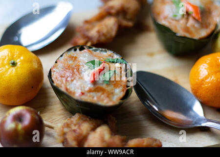 Traditional Thai food called haw moak which is a steamed curried fish ...