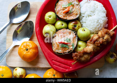 Traditional Thai food called haw moak which is a steamed curried fish ...