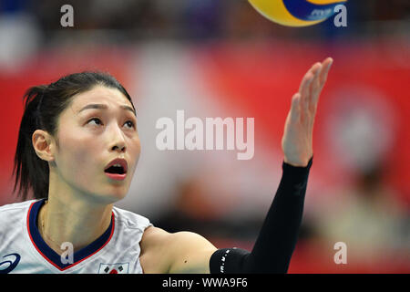 Kim Yeon-koung of South Korea spikes the ball against Italy during ...