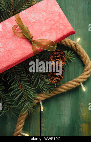 Gift box with pink bow ribbon on blue background Stock Photo - Alamy