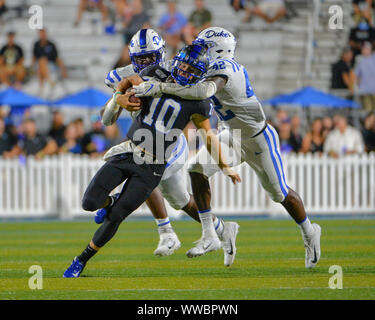 Duke linebacker Shaka Heyward runs a drill at the NFL football scouting ...