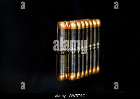 40 Caliber hollow point ammunition on black background Stock Photo - Alamy