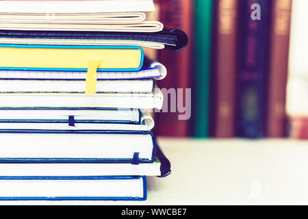 Notebooks piles, stack of books education back to school background ...