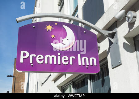 Premier Inn hotel signage on Putney Bridge, London, UK Stock Photo - Alamy