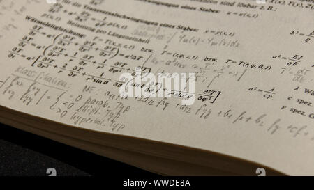 Math formulas are written in pencil on a piece of paper, math pr Stock ...