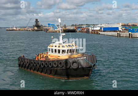 Port of Poole, southern England, UK. A deck cargo vessel underway and ...