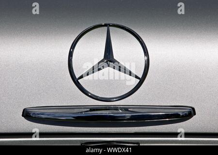 Mercedes-Benz three pointed star car badge and logo or hood-ornament ...