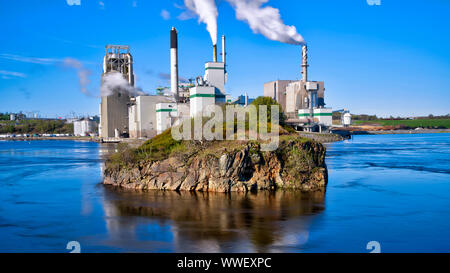 Irving Pulp and Paper mill with reversing falls flowing by on the Saint ...
