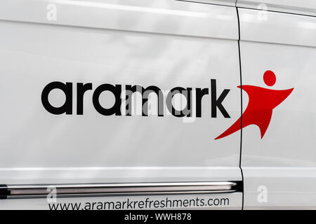 Aramark sign and logo on delivery van. Aramark Corporation is an ...