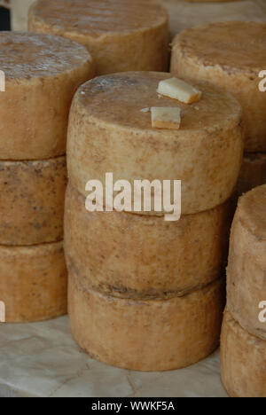 craft ewe's cheeses in a market in corsica Stock Photo - Alamy