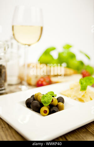 mixed starter with parma parmesan tomato olives on a plate Stock Photo ...