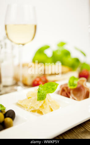 mixed starter with parma parmesan tomato olives on a plate Stock Photo ...