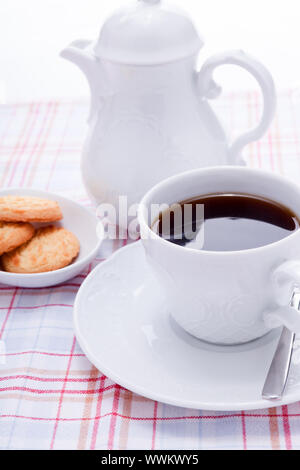 fresh biscuits with a pot of coffee and a cup of tea Stock Photo - Alamy