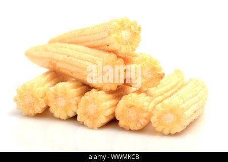 Mini Sweetcorn closeup on white background Stock Photo - Alamy