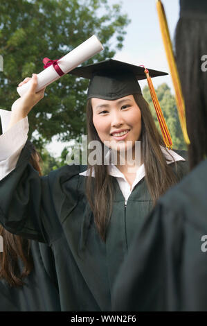 Group Students Hands Raised Graduation Concept Stock Photo - Alamy
