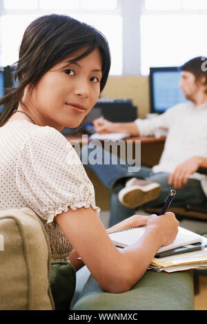 Young Asian woman making a pair of spectacles with her hands Stock ...