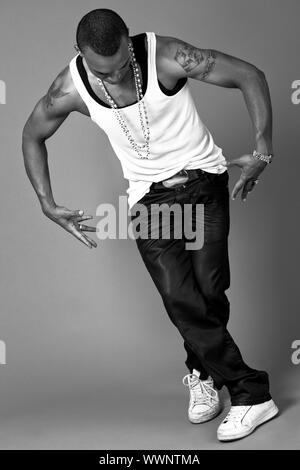Monochrome image of a hip hop dancer indoor studio Stock Photo - Alamy