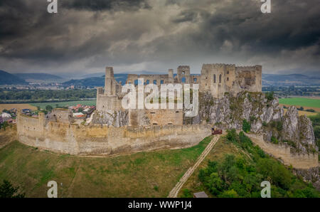 Aerial view of medieval ruined Beckov castle in Slovakia above the Vah ...