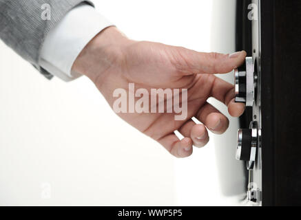 Man turning channel knob on retro television Stock Photo - Alamy