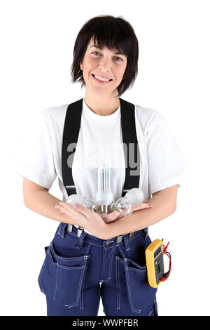 Female electrician holding light bulbs Stock Photo - Alamy